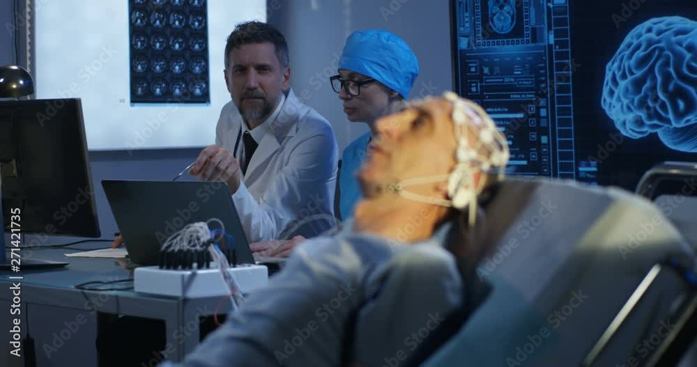 Patient lying in bed during EEG examination Stock ビデオ | Adobe Stock