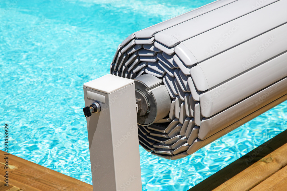 pool shutter to conserve heat and protect from accidental falls Stock ...