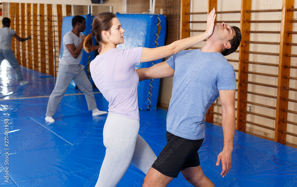 People practicing self defense techniques Stock Photo | Adobe Stock