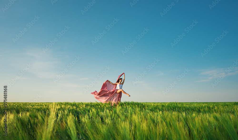 Classic dance on nature background. Professional female modern dancer ...