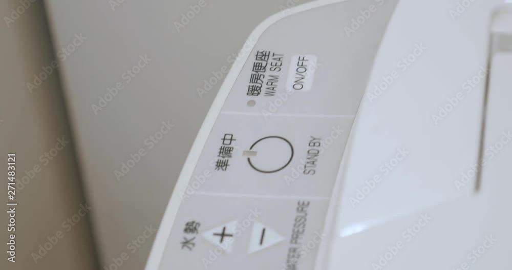 Electronic control panel for a Japanese toilet, slow pan up the panel ...