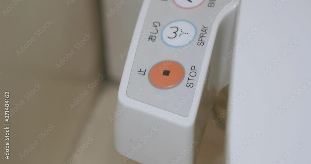 Electronic control panel for a Japanese toilet, slow pan down the panel ...