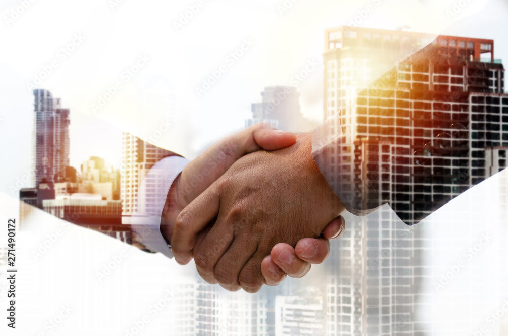 Partnership. double exposure image of investor business man handshake ...