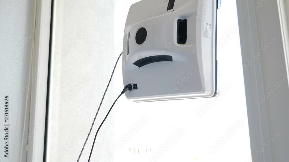 Clean service. Modern way of windows cleaning. Robotic glass washer ...