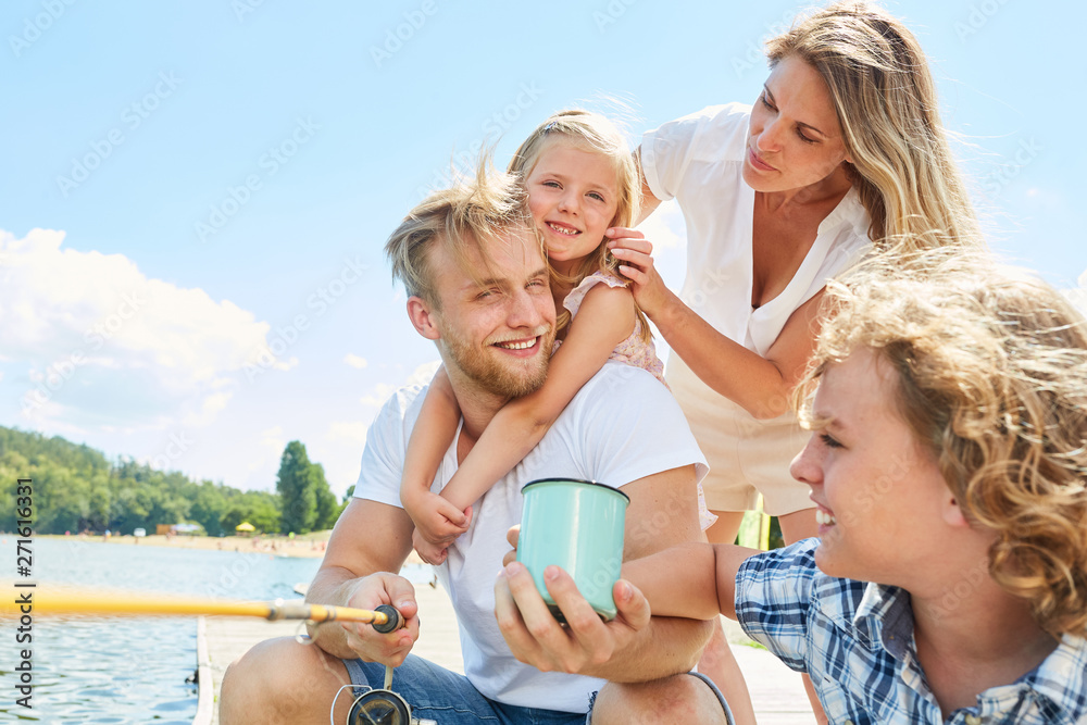 Family and kids fishing together Stock Photo | Adobe Stock
