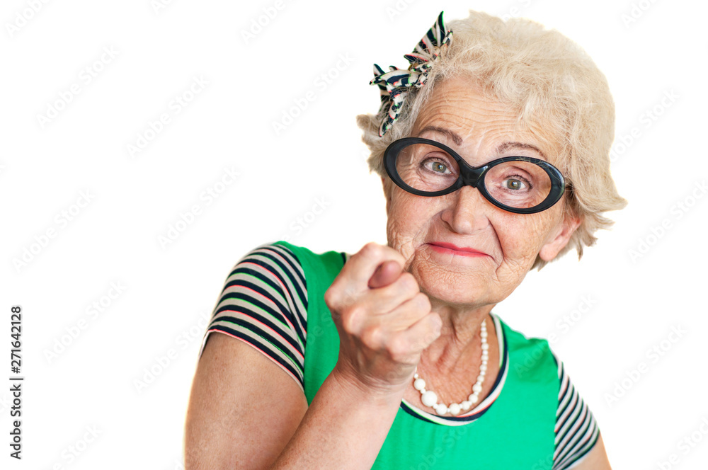 Stylish elderly woman with an evil face shows a fig. Concept protest ...