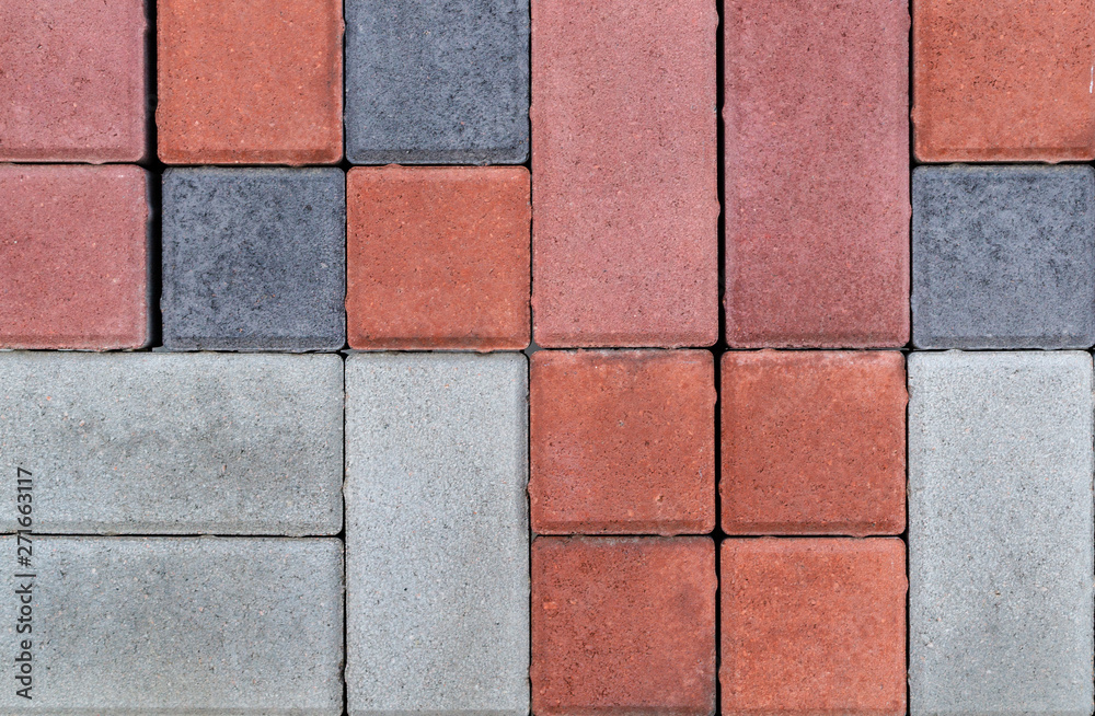 The texture of the paving bricks of different colors for construction ...