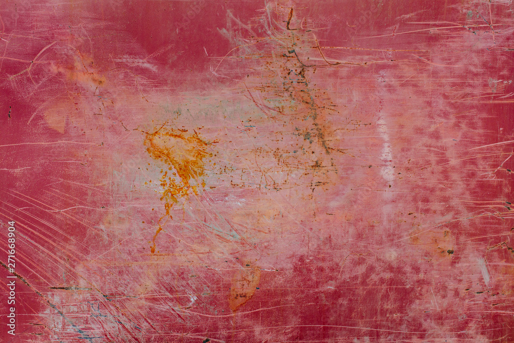 Painted red metal with rust and scratch markings,Painted red metal with ...