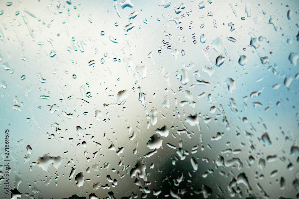 Glass with natural water drops. Condensate drips on the clear glass ...