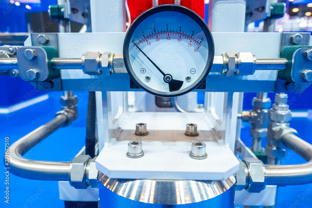 Gauge. The pressure gauge is attached on the pipes. Mechanical meter ...