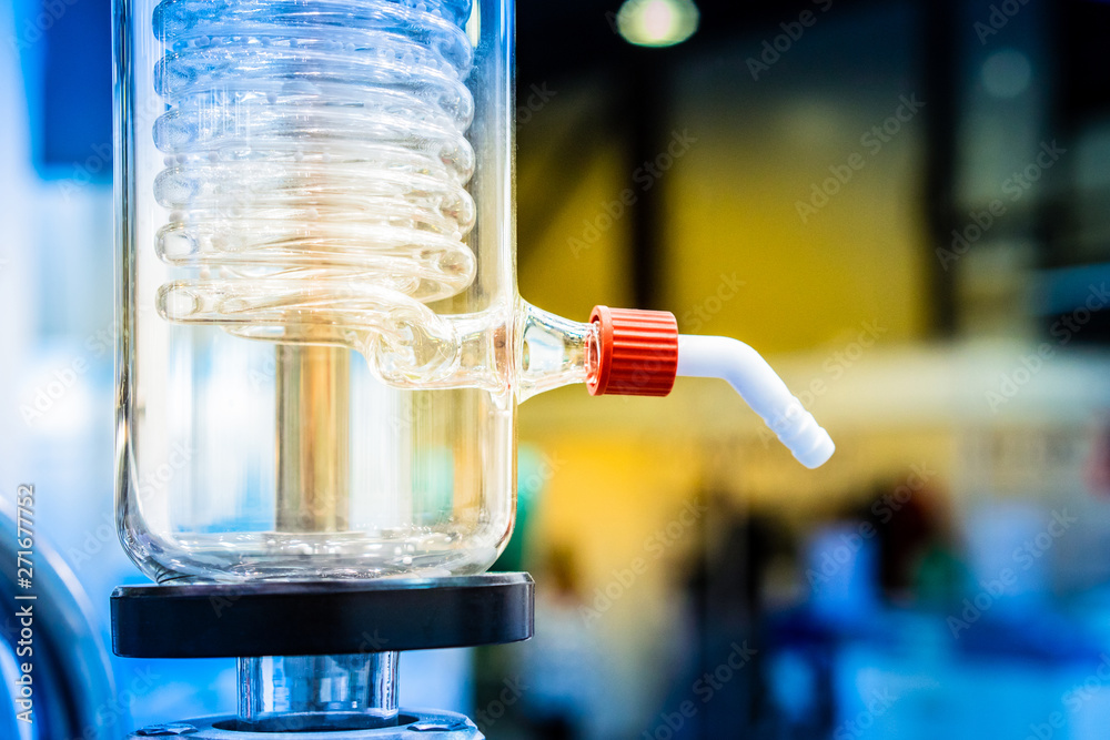 Laboratory rotary evaporator. Tap to drain the released liquid. Device ...