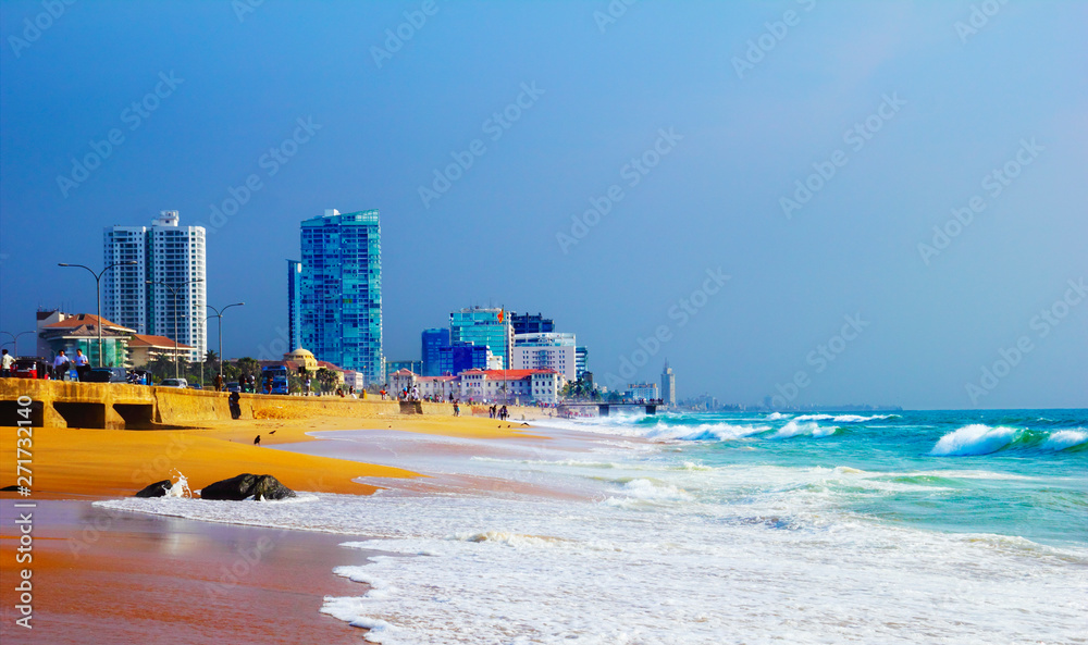 Beautiful City beach with a heavy surf of Indian ocean, bright yellow ...