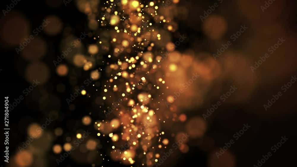 gold particles in liquid float and glisten. Background with glittering ...