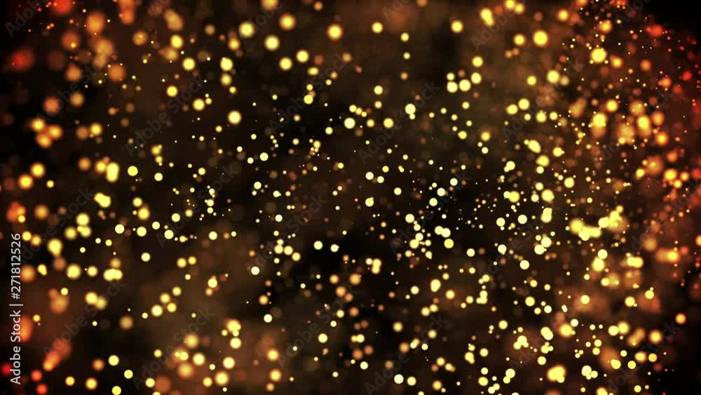 gold particles in liquid float and glisten. Background with glittering ...