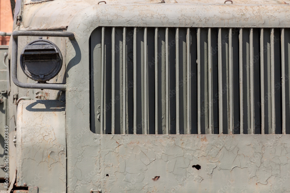 metal parts of the body of military equipment close-up. Armored war ...