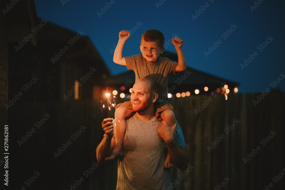 Happy Family doing sparkler fireworks together Stock Photo | Adobe Stock