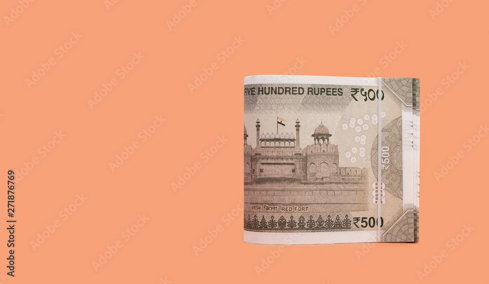 Folded set of Indian 500 Rupee currency bills isolated on Apricot ...