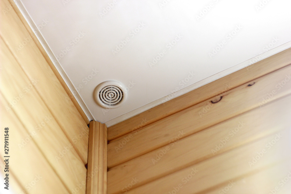 Fire alarm of fire detector on a ceiling. Smoke sensor in corner of ...