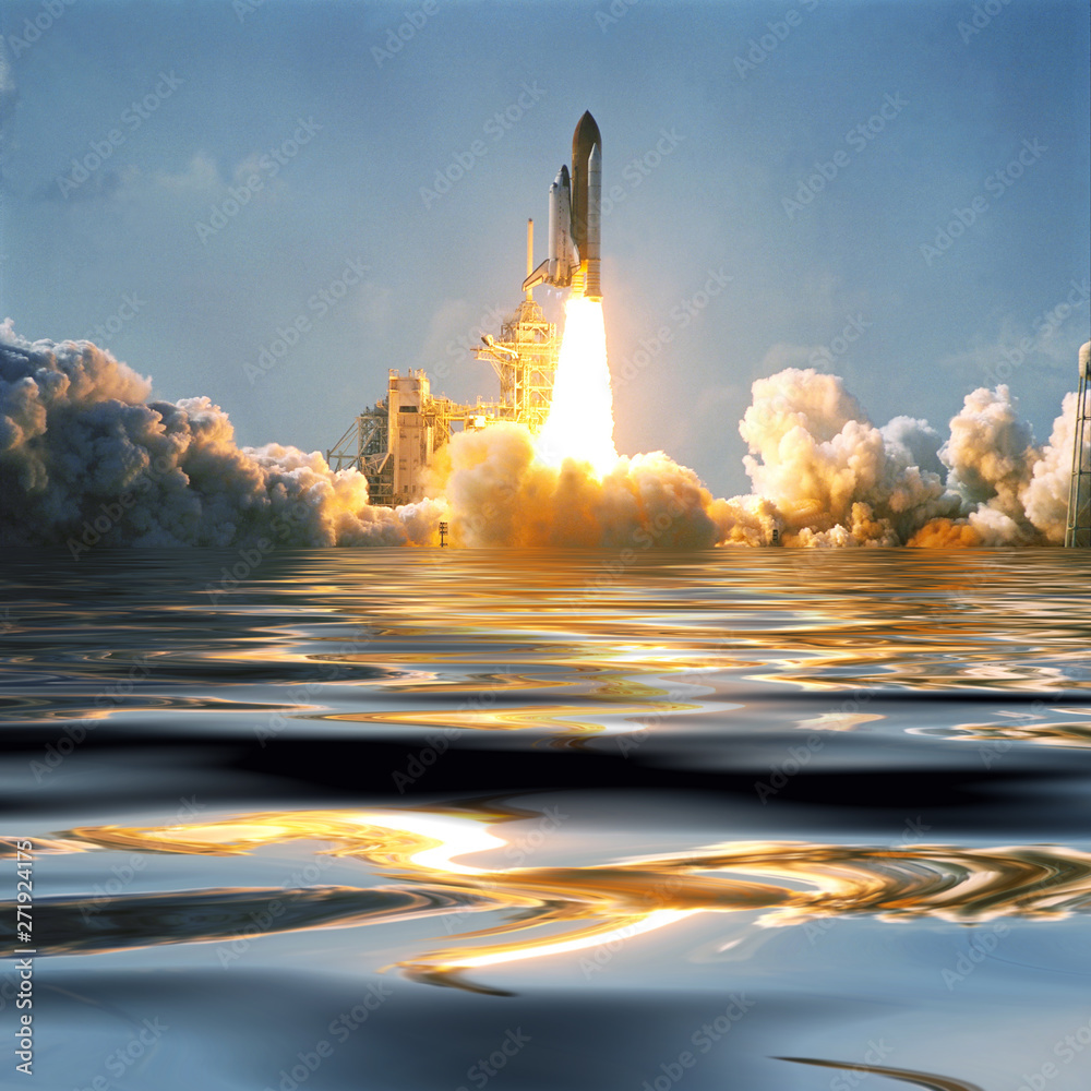 Water and fascinating liftoff of the rocket. Rocket shuttle spaceship ...
