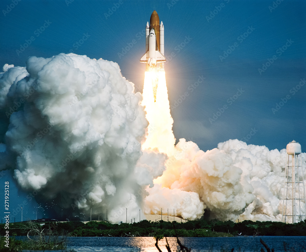 Rocket takes off into the sky. Lots of smoke and gas. The elements of ...