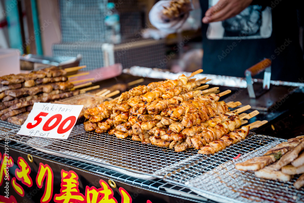 A Japanese type of skewered chicken selling at Arashiyama food stall ...