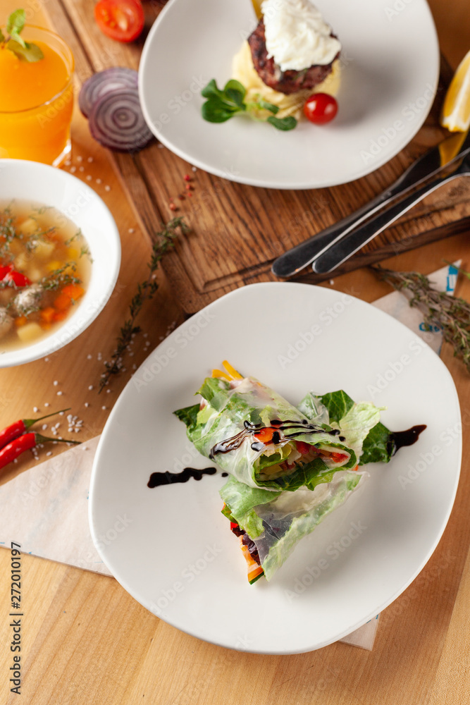 Vegetarian spring rolls in a thin rice paper, stuffed with carrot ...