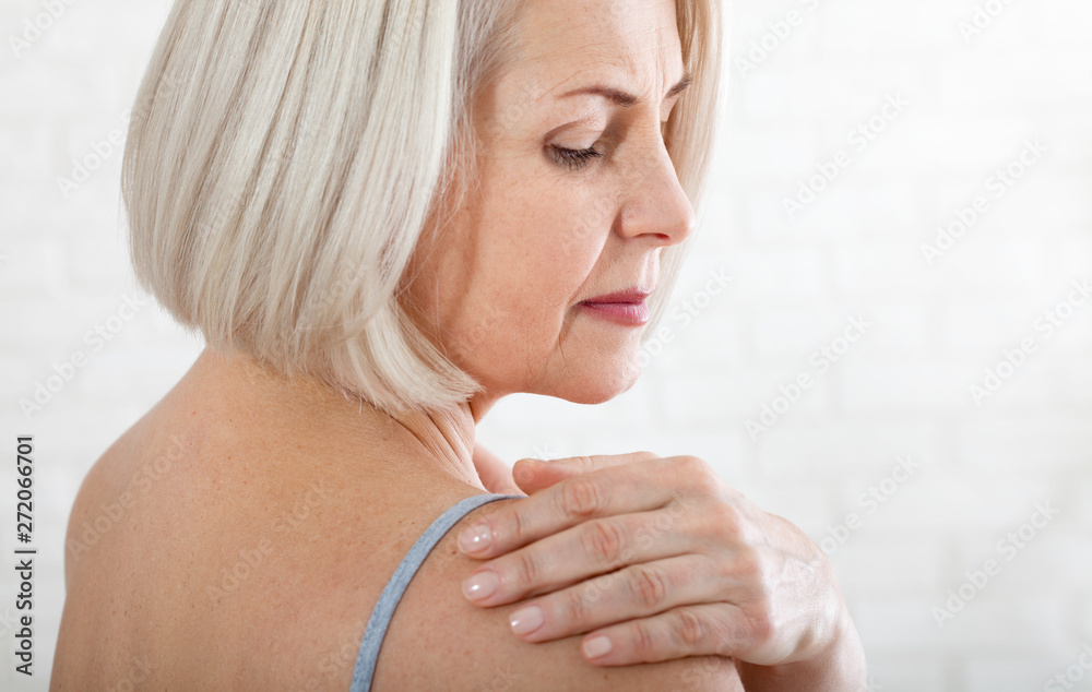 Woman with a pain in the body. Concept photo with indicating location ...