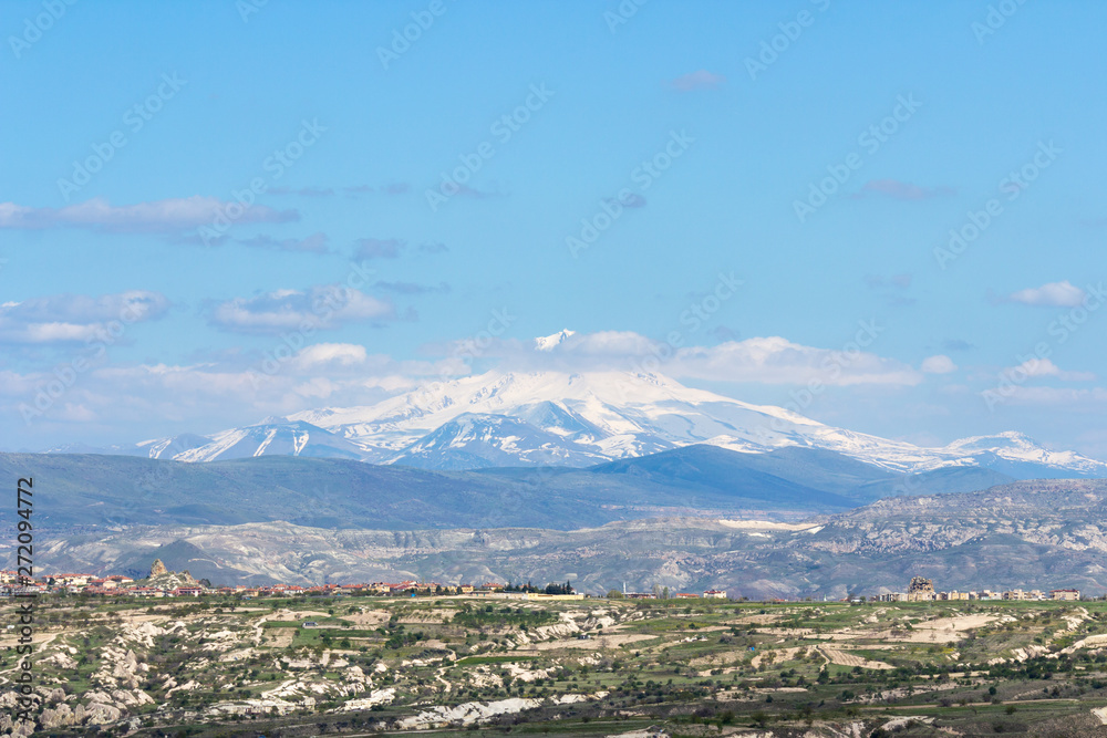 View of the Mount Erciyes ( Turkish: Erciyes Dagi ) from Uchisar Castle ...