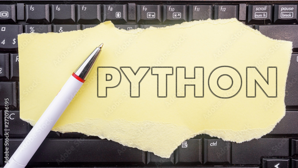 Python programming language. Paper width word Python and pencil on ...
