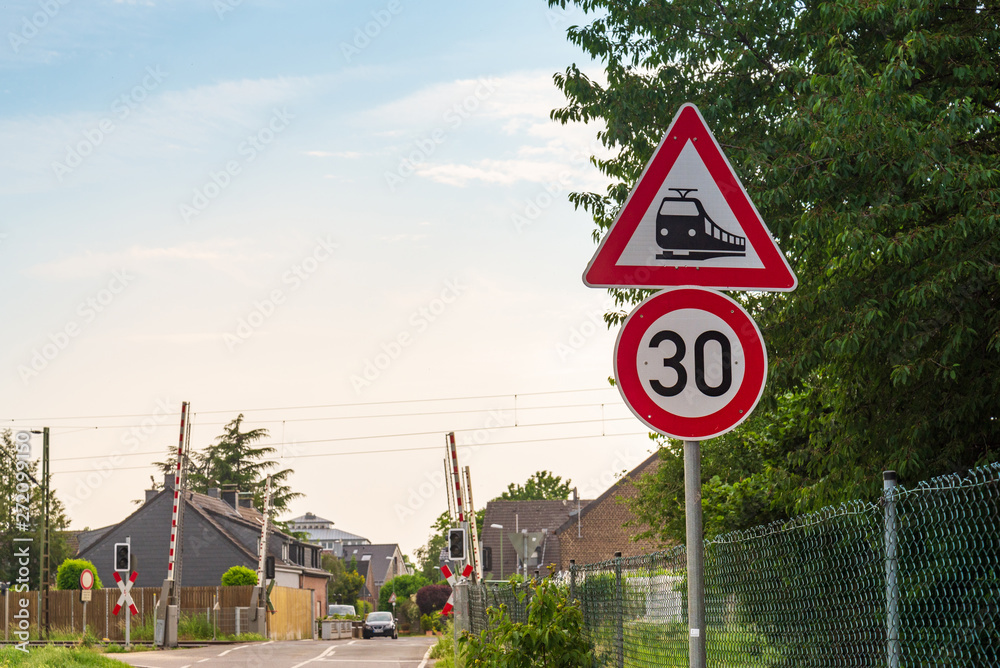 Outdoor sunny view selected focusing view at waring sign caution train ...