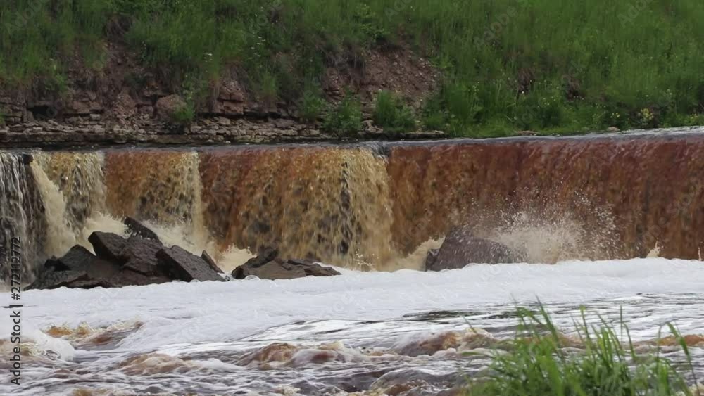 Sablinsky waterfalls. Little waterfall. The brown water of the ...