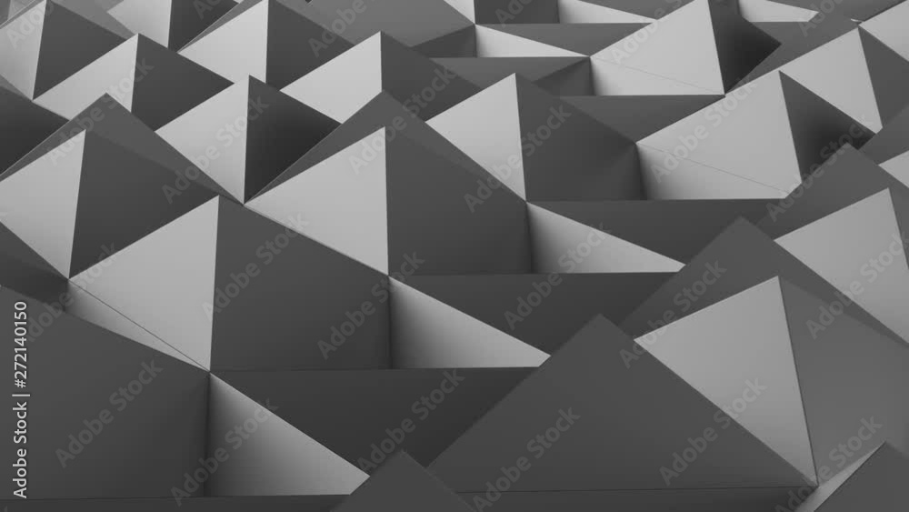 3d abstract render with triangle forms that goes up and down in random ...
