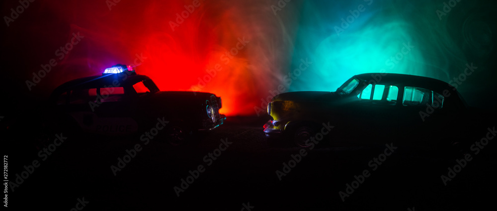 Police car chasing a car at night with fog background. 911 Emergency ...