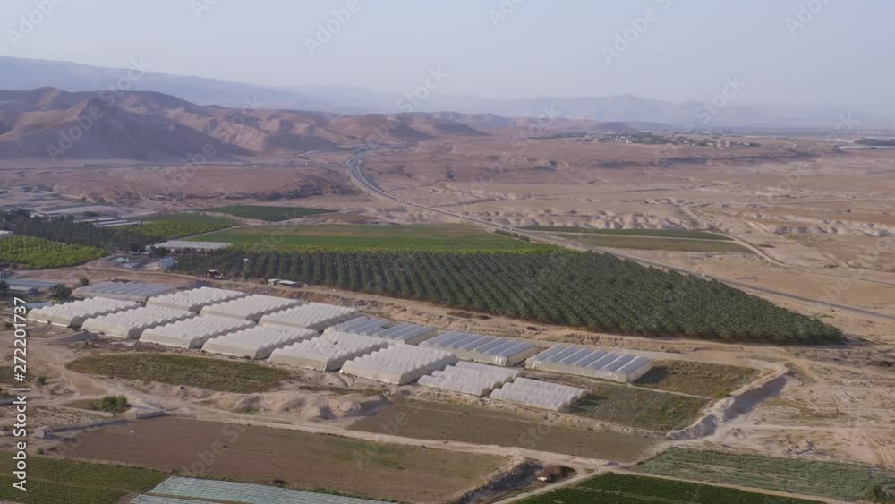 Flying above farming agricultural tents in south Israel kibbutz 4k ...