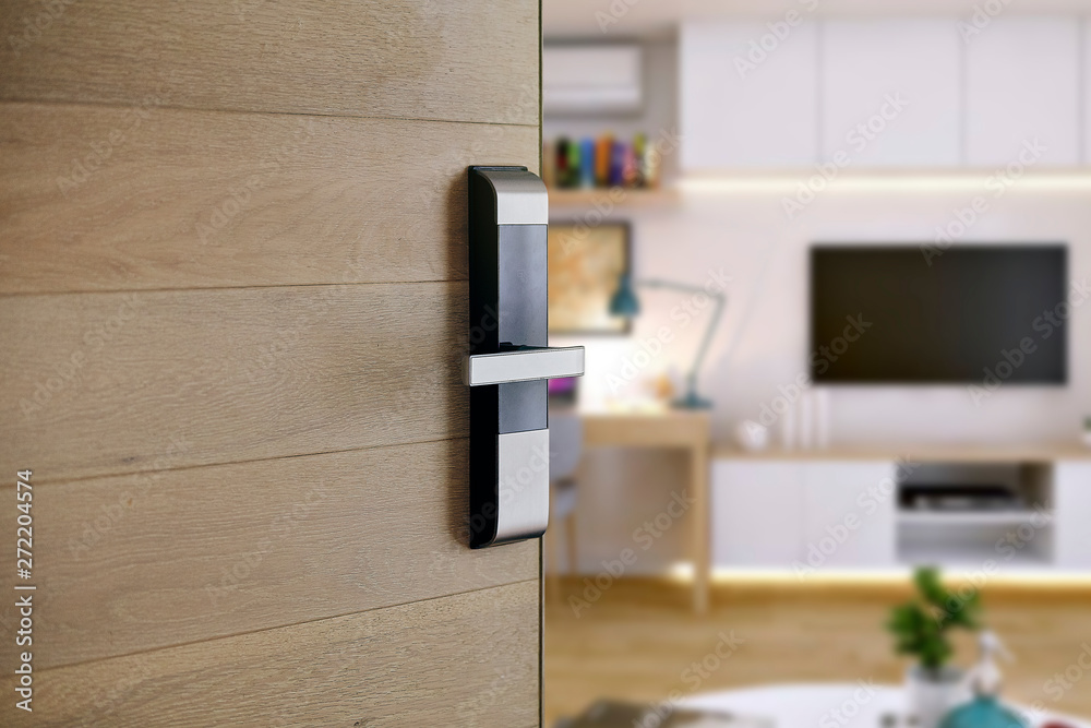 Digital door lock installed on wood door for security and access the ...