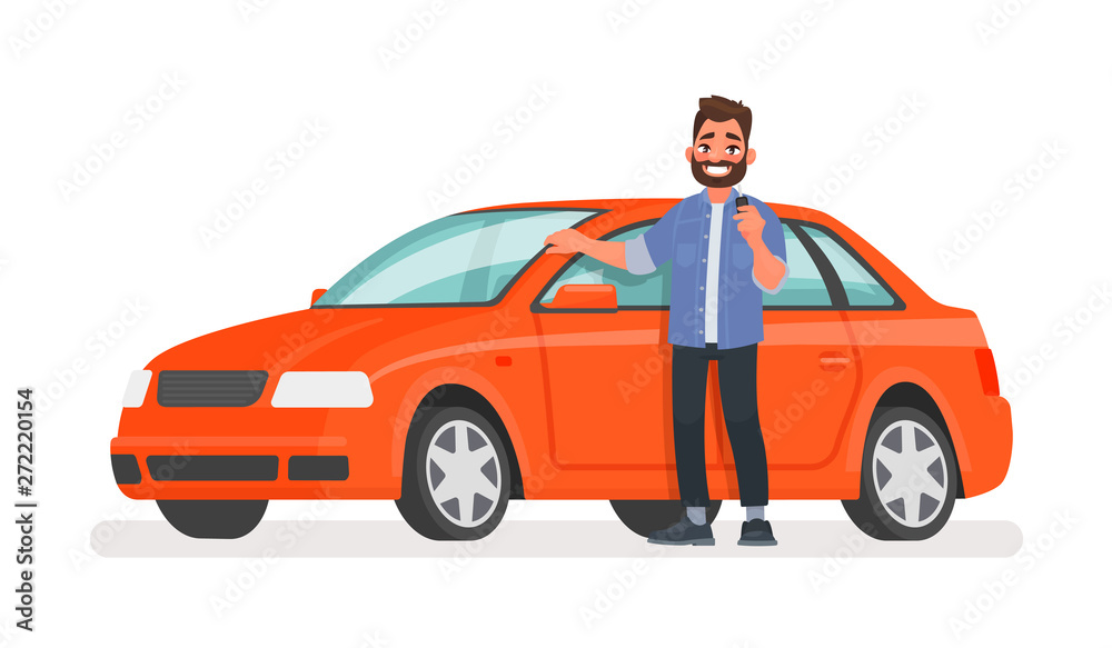 Man stands next to a new car and holds a key in his hand. Happy vehicle ...