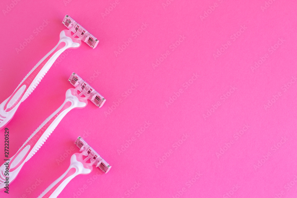 Three female razors pink color on an a pink background. Razor for ...
