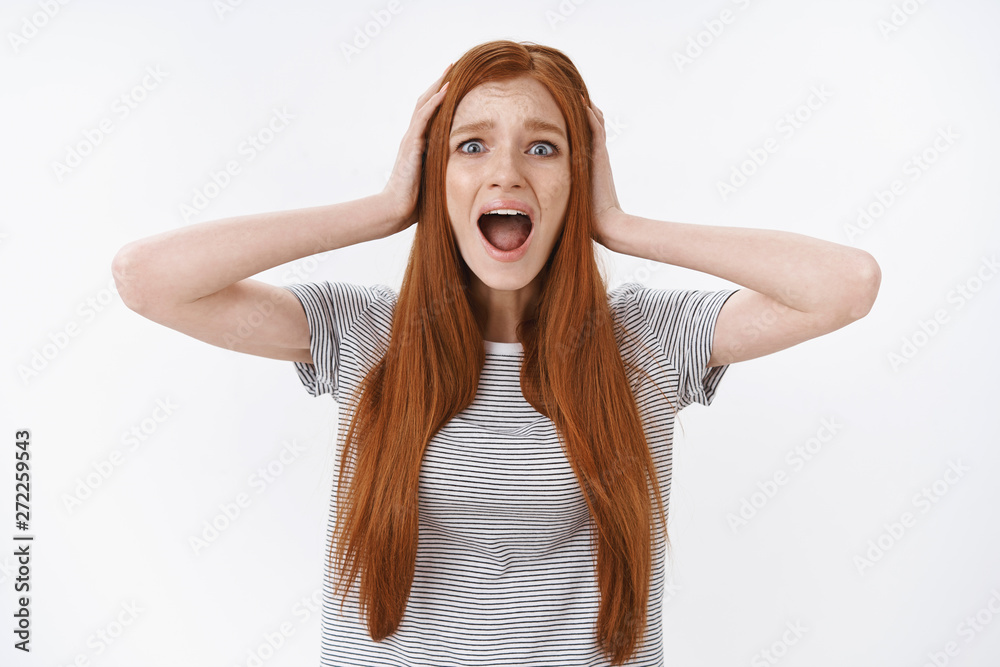 Freaked out shocked disappointed redhead girl screaming displeased ...