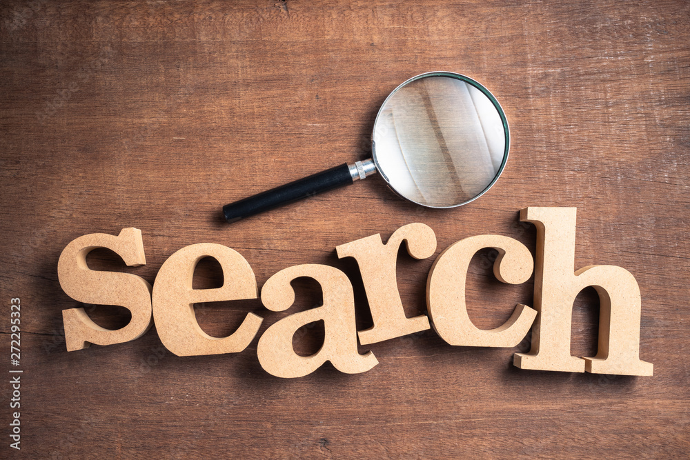 SEARCH word with Magnifying Glass Stock Photo | Adobe Stock