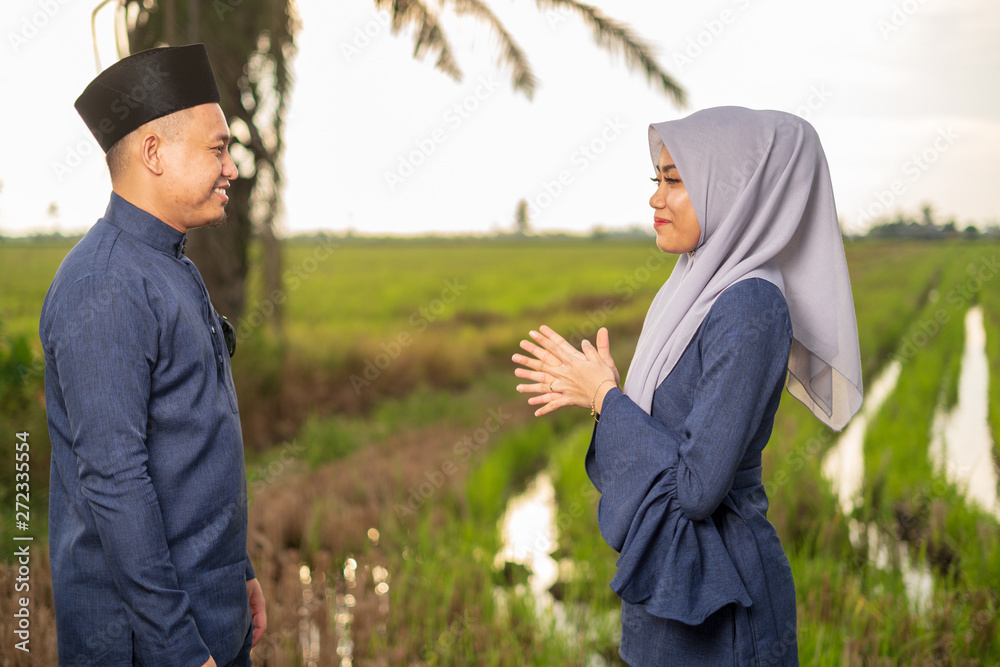 muslim friends and families visiting home and greet embrace each other ...