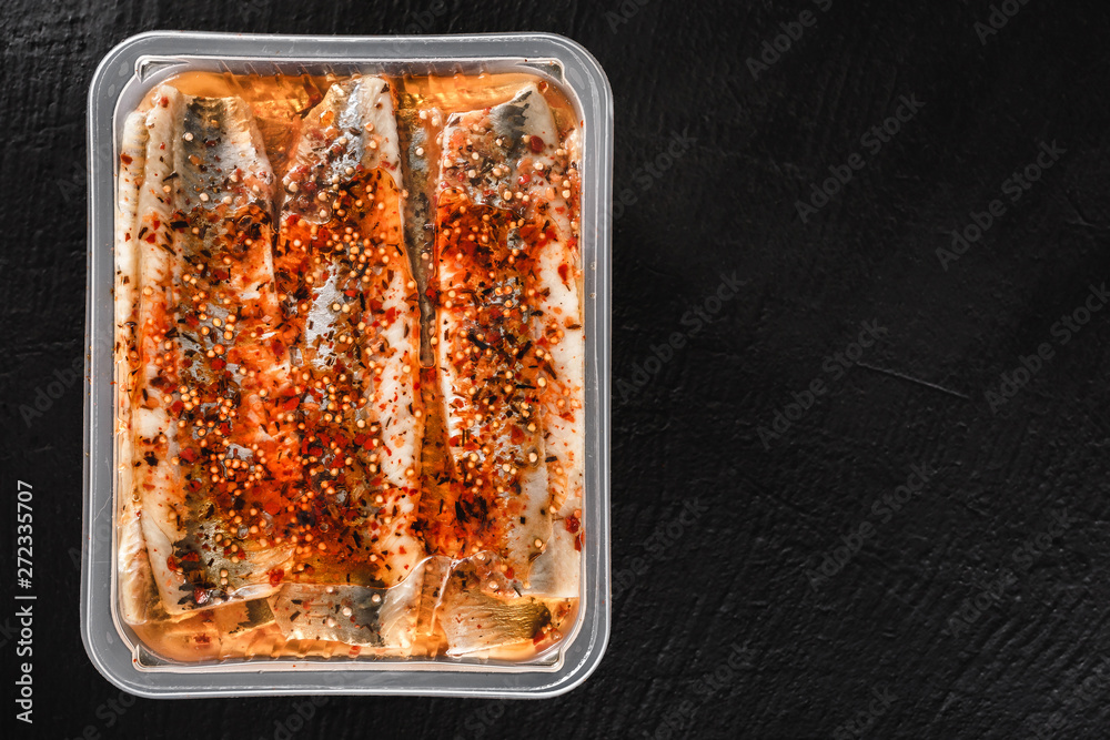 Marinated fillet mackerel or fillet herring fish with spices packed in ...