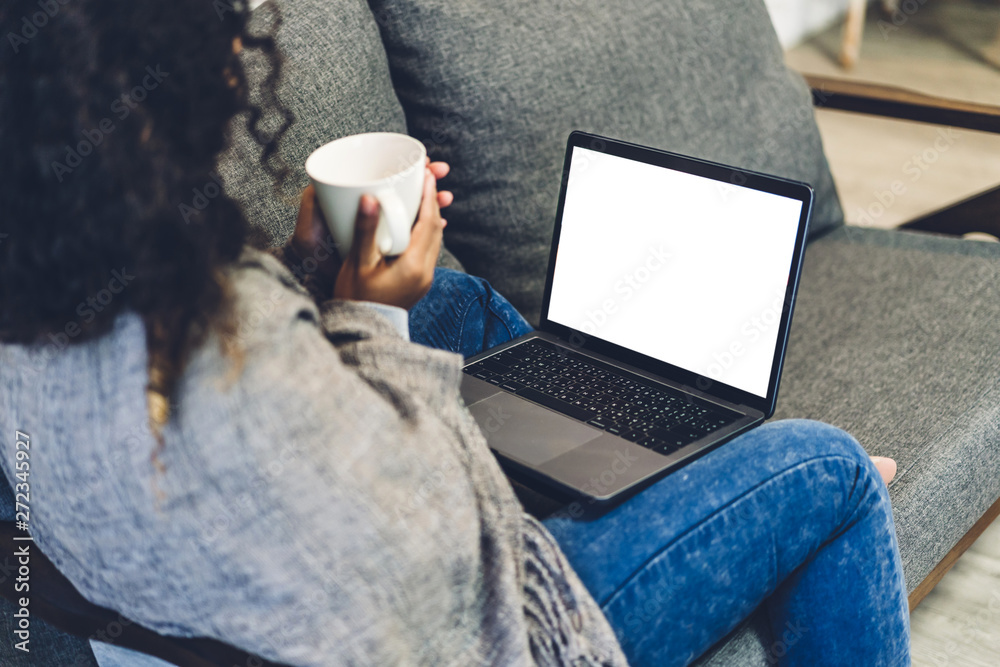 Young african american black woman relaxing and using laptop computer ...