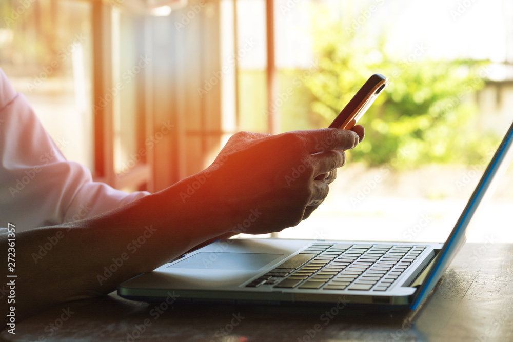 Causal professional Business man using multichannel services with ...