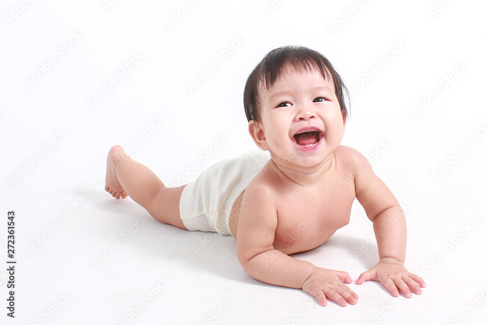 Portrait of happy little asian baby boy or girl sitting on floor. Childhood, babyhood and people ...