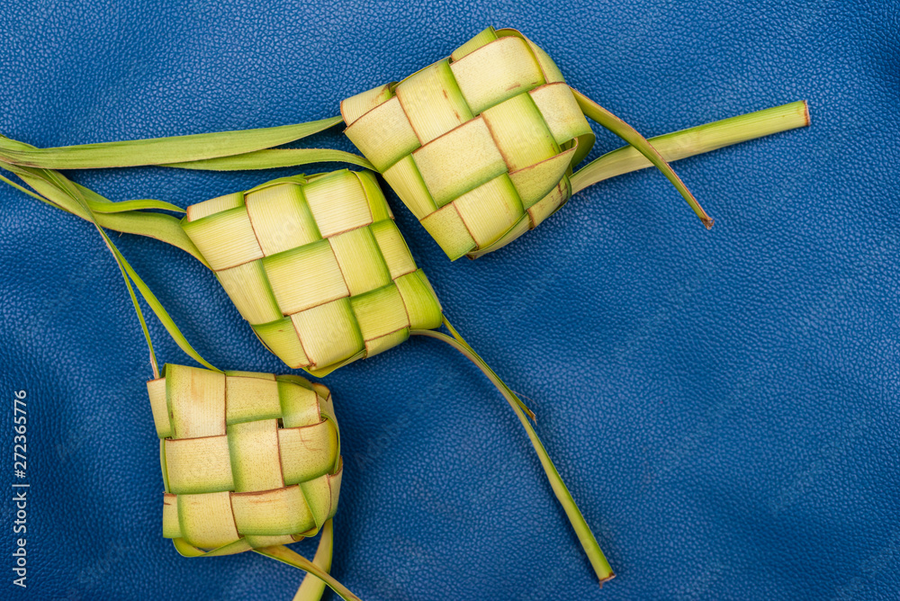 Ketupat Pouches on a blue background. Ketupat is a type of dumpling ...