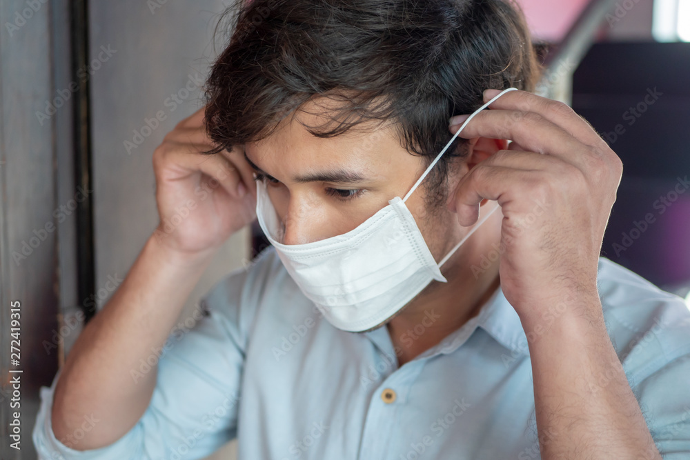 man wearing air filter mask in unhealthy, danger, polluted air ...