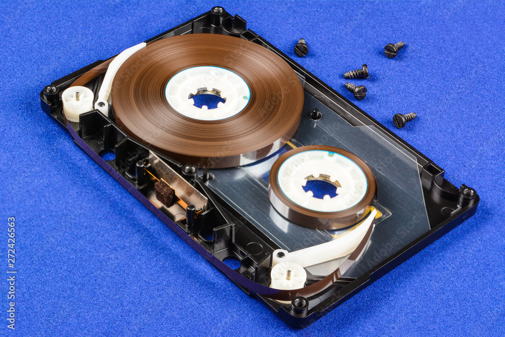 Disassembled audio compact cassette with SM mechanism. Audio cassette ...