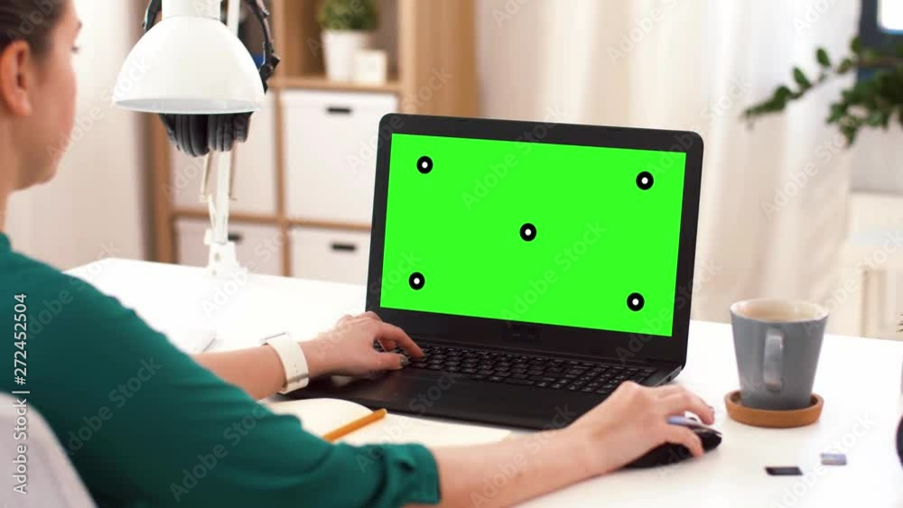 technology, post production and people concept - woman with chroma key ...