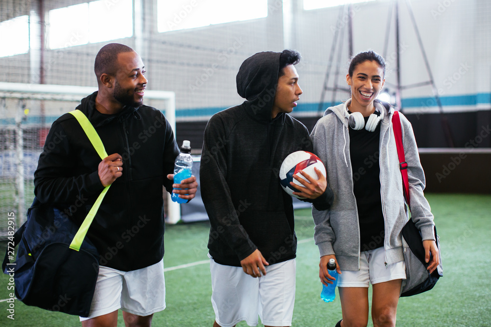 Multicultural soccer players in football field. Stock Photo | Adobe Stock