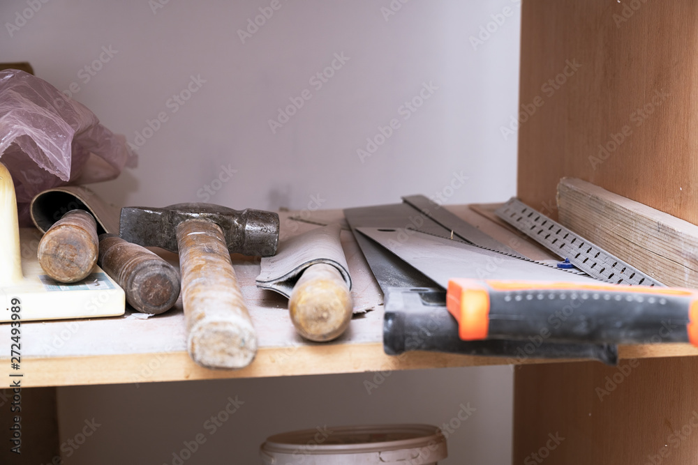 Carpenter's tools on the shelf. Saw, hammer, chisel, and so on Stock ...